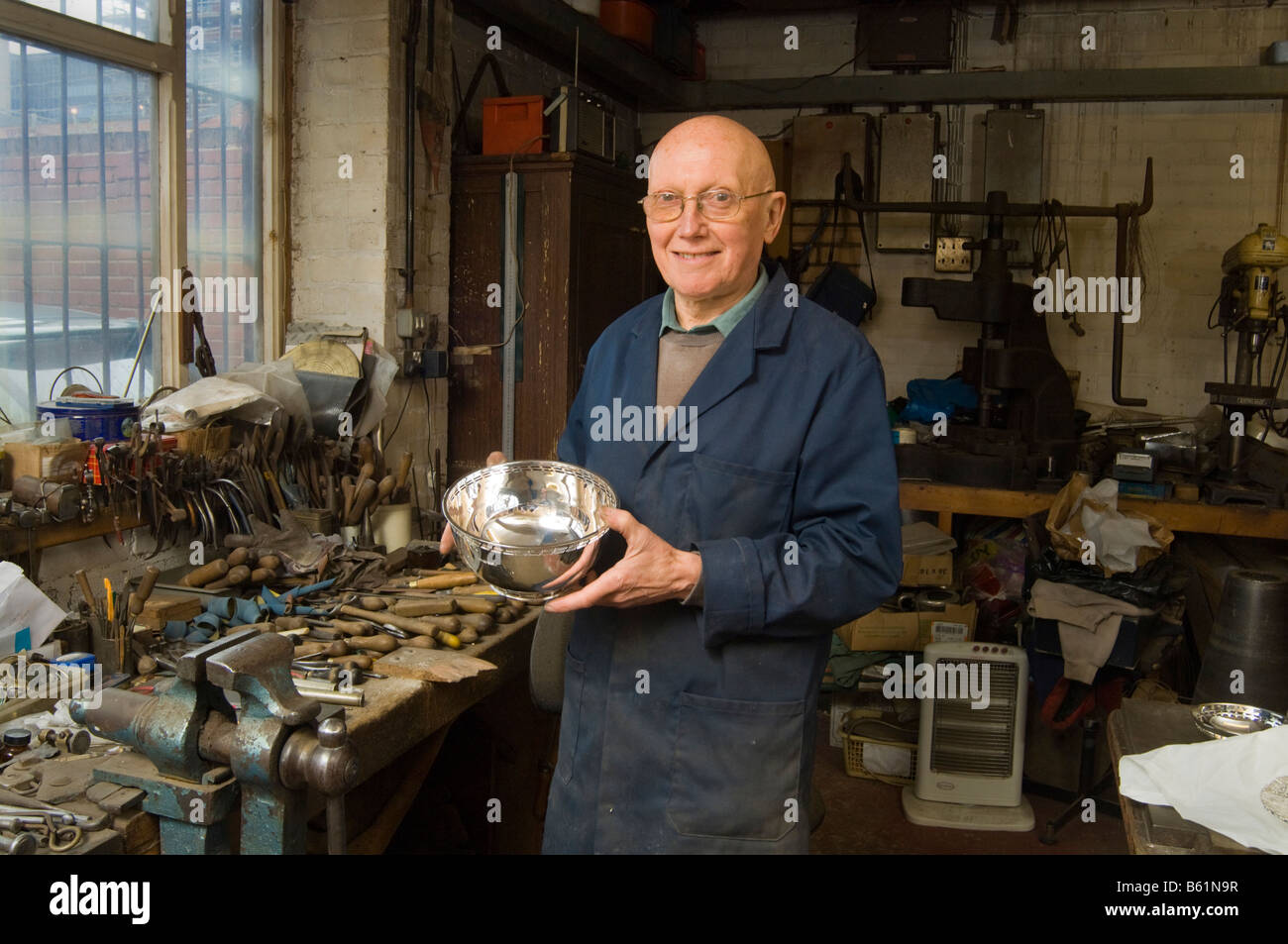 Silversmith Robert Lamb at his workshop in Sheffield Stock Photo - Alamy