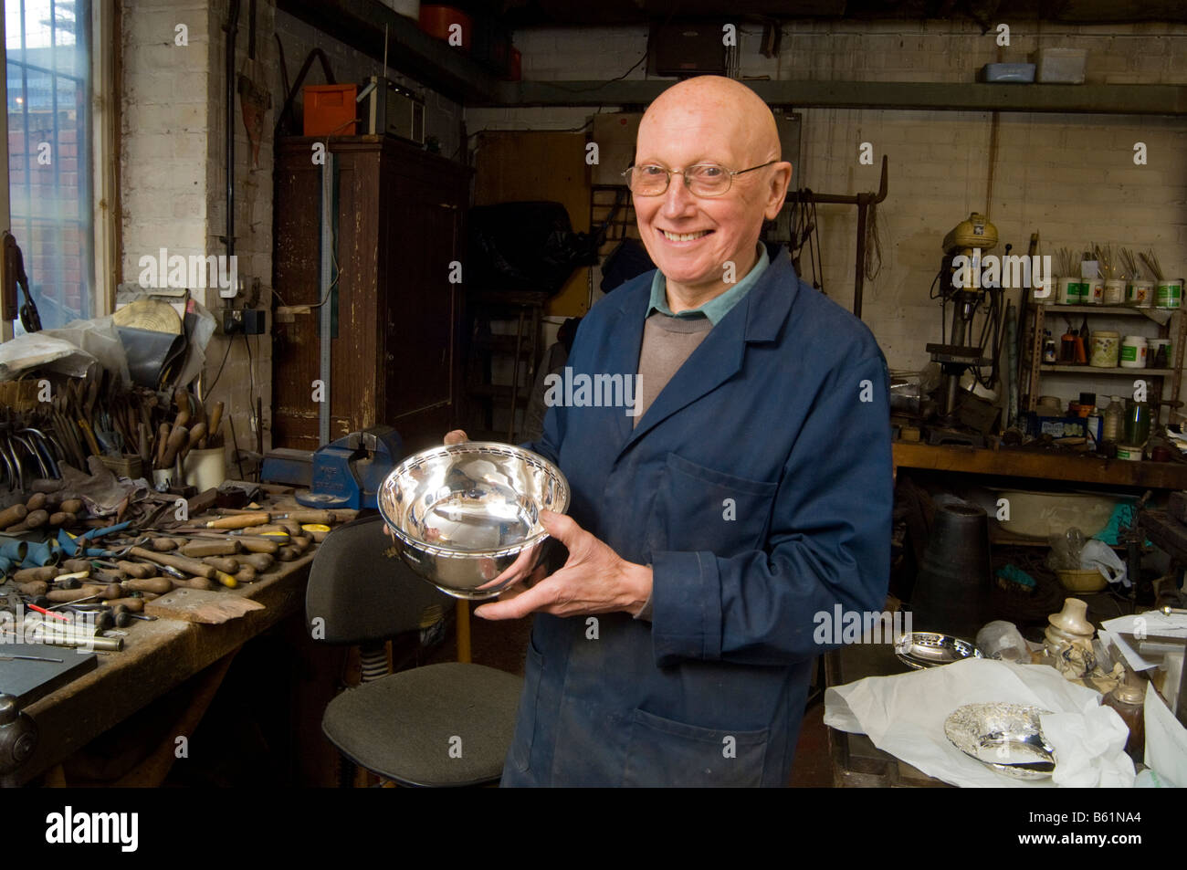Silversmith Robert Lamb at his workshop in Sheffield Stock Photo - Alamy