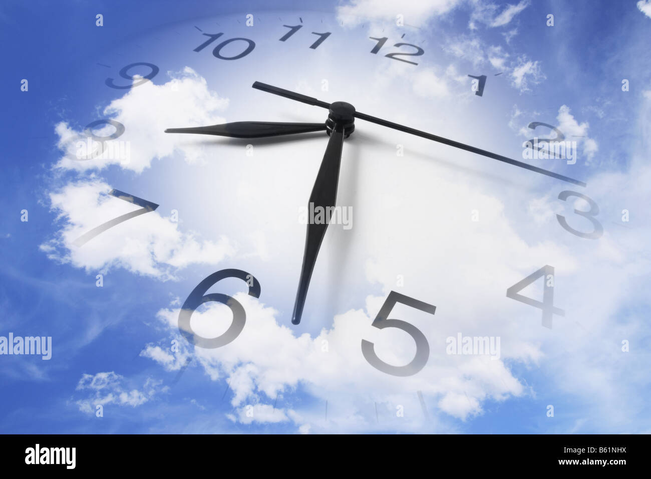 Clock and Clouds Stock Photo - Alamy