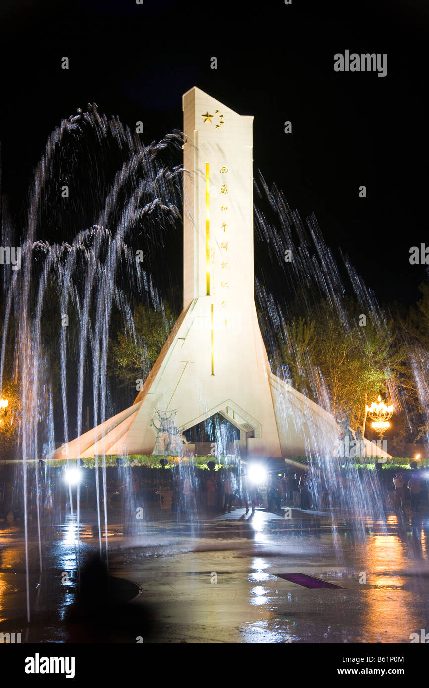 Floodlit Peaceful Liberation Monument and fountains at night, Potala ...