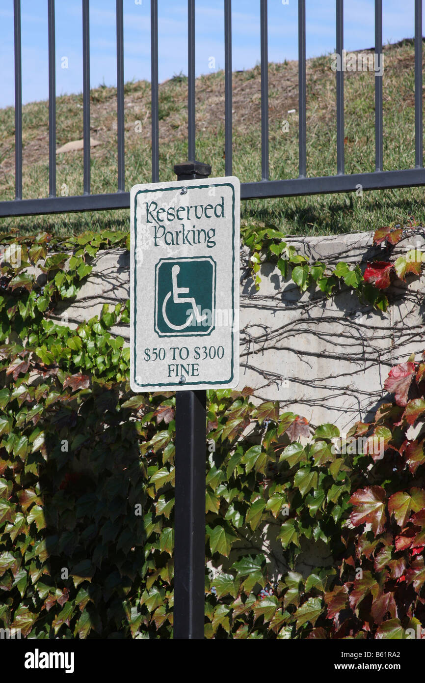 A fancy European looking handicap parking sign Stock Photo - Alamy