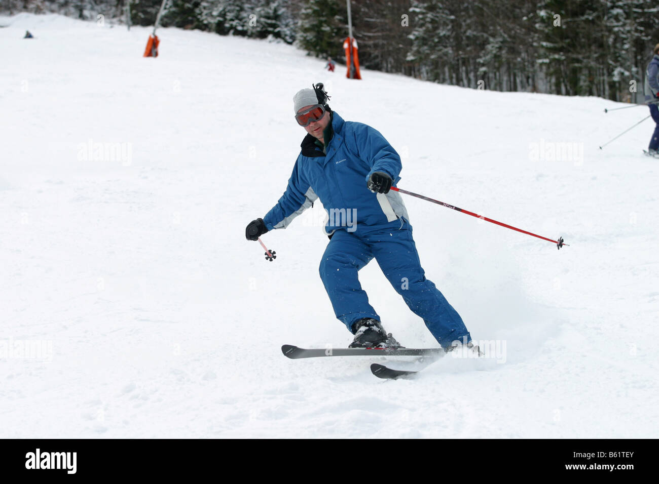 A man skiing on snow Stock Photo - Alamy