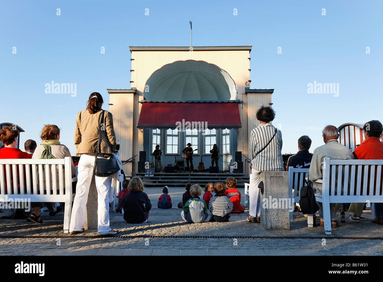Audience at a concert on the beach promenade, stage pavillon, Bansin ...