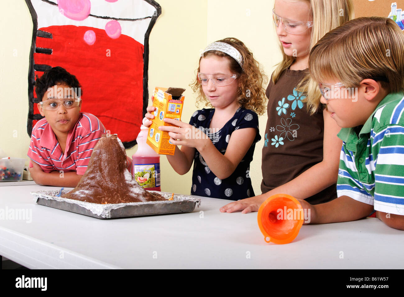 School kids working on a volcano science project Stock Photo - Alamy