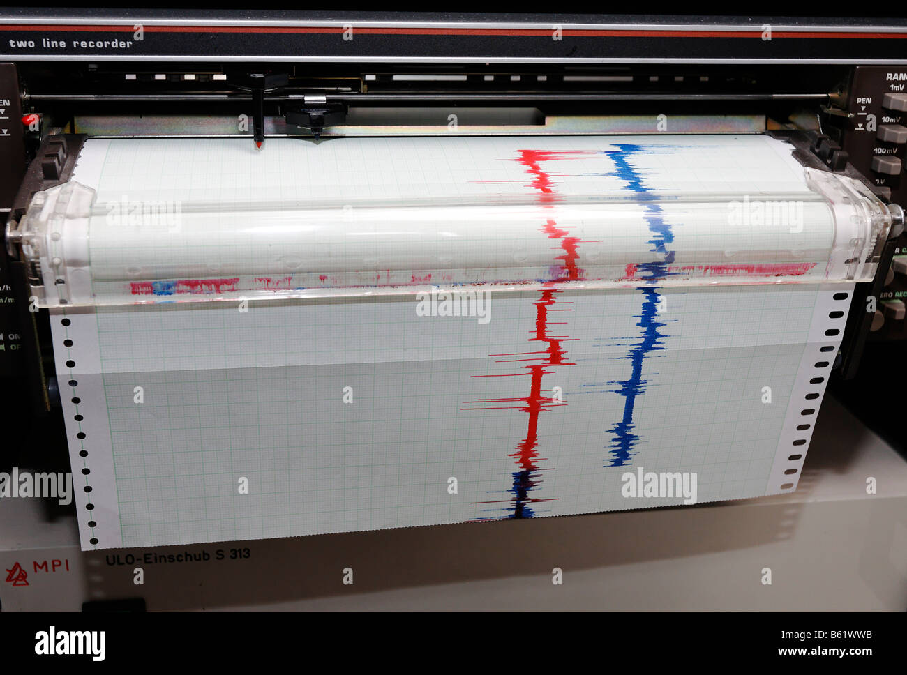 Recorder of a measuring instrument, red and blue lines on milimeter ...