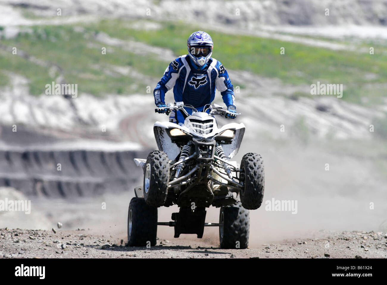 Yamaha Quad driving off-road Stock Photo - Alamy