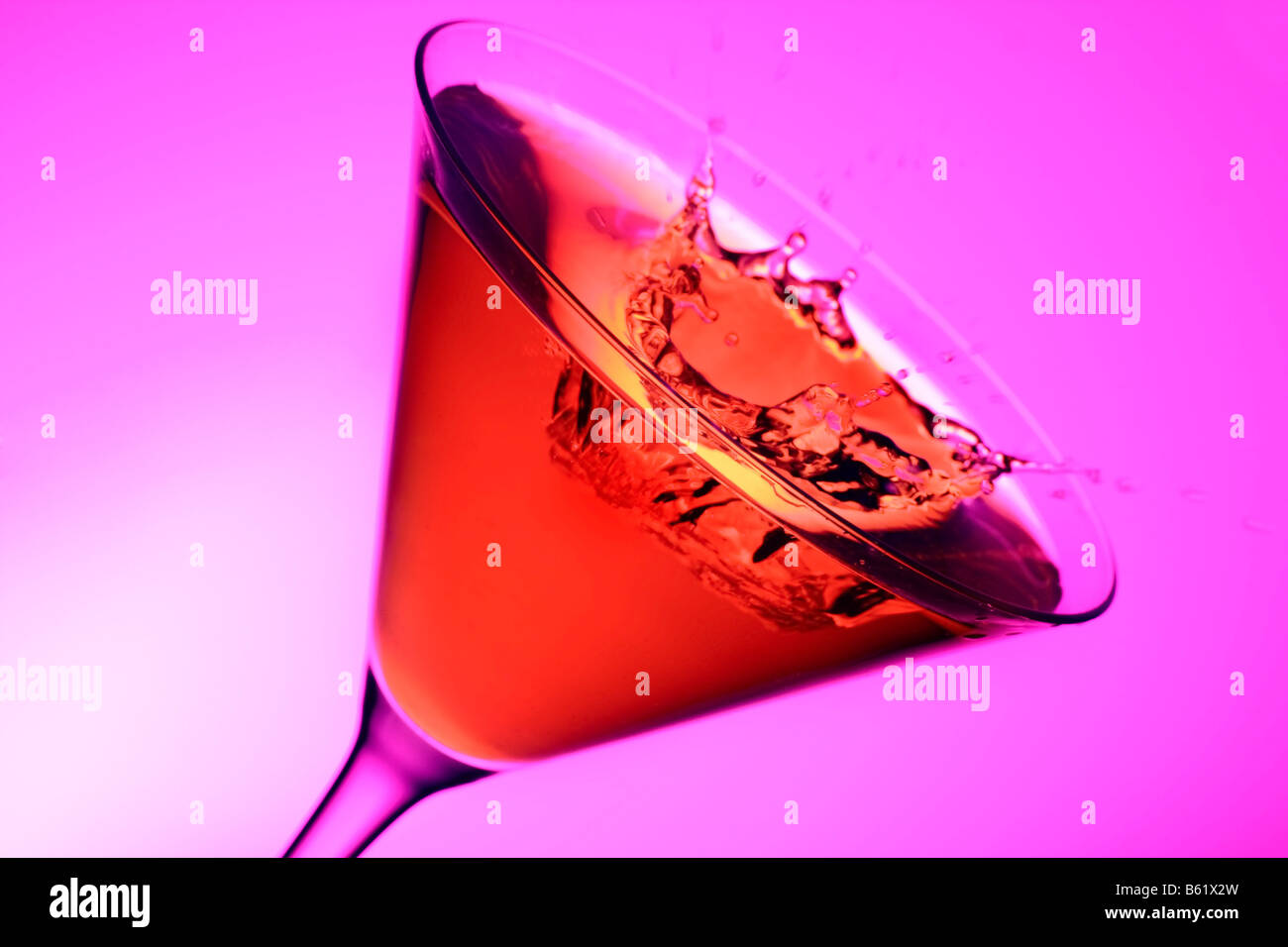 sophisticated cosmopolitan cocktail with splash Stock Photo - Alamy
