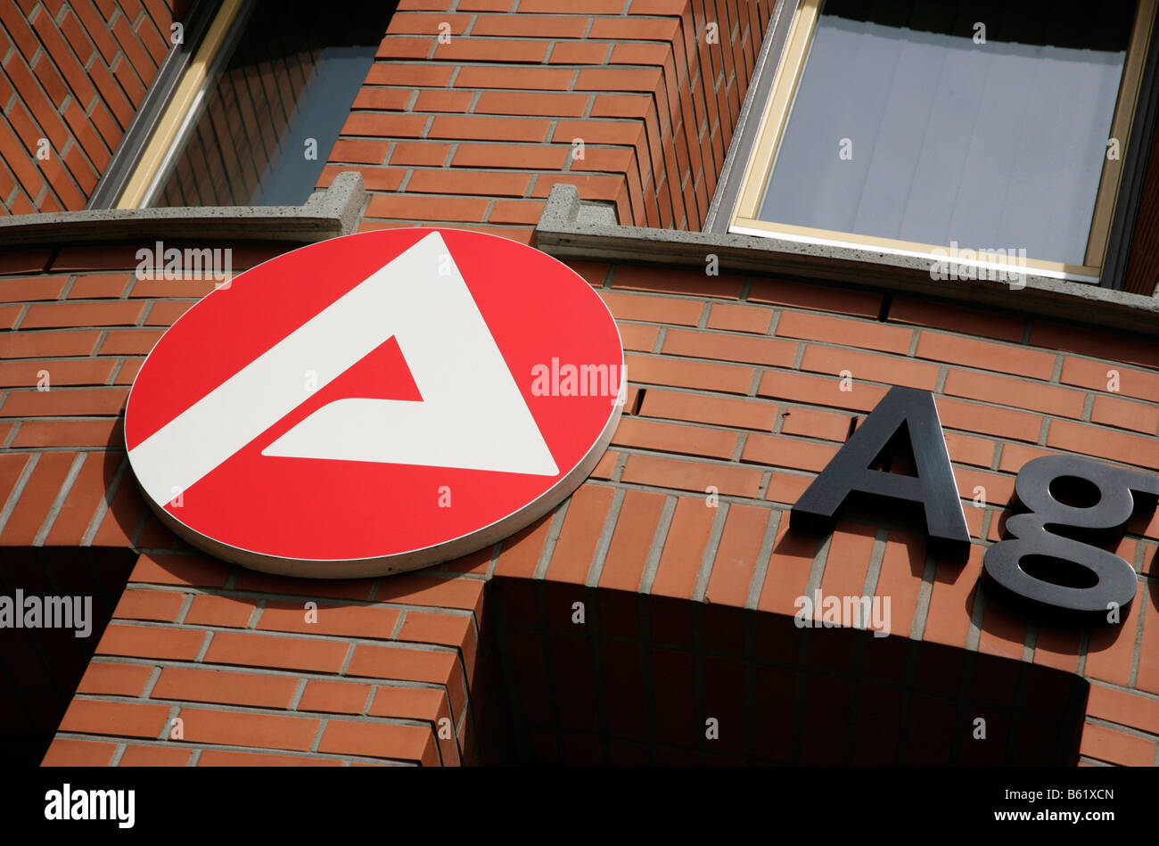 Symbol of the German Federal Employment Agency on the facade of a ...