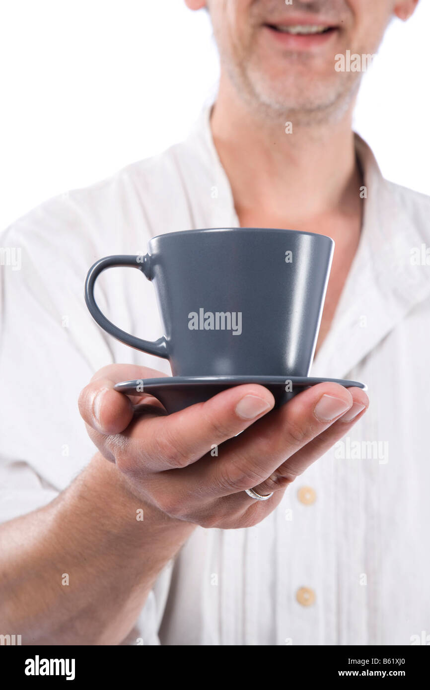The old man hand holding a coffee cup hi-res stock photography and ...