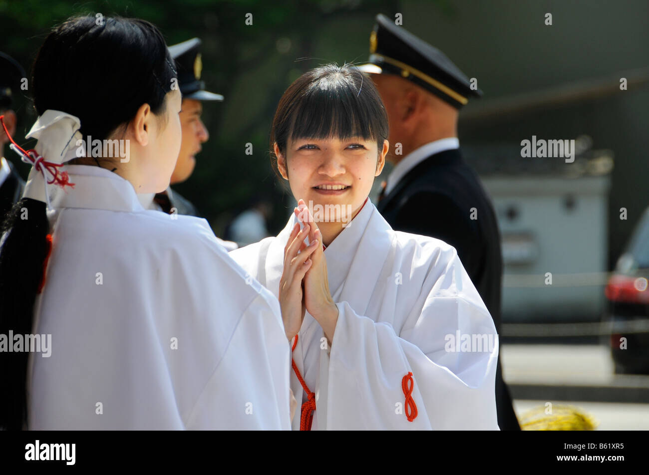 Shinto temple servants or shrine maidens, called Mikos, at the Kamigamo ...