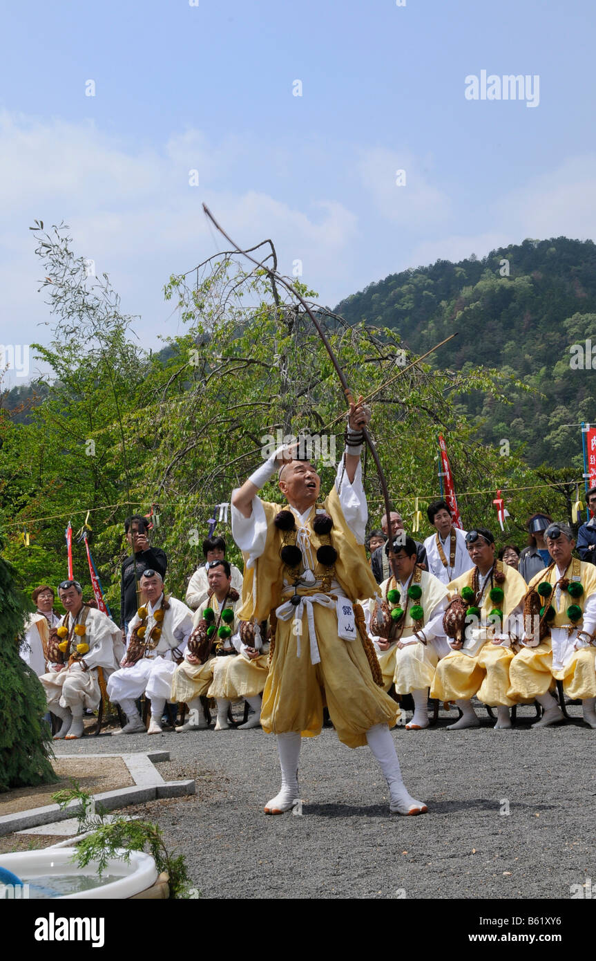 Ritual shooting of arrows in all quarters by a Yamabushi, Kyoto, Japan ...