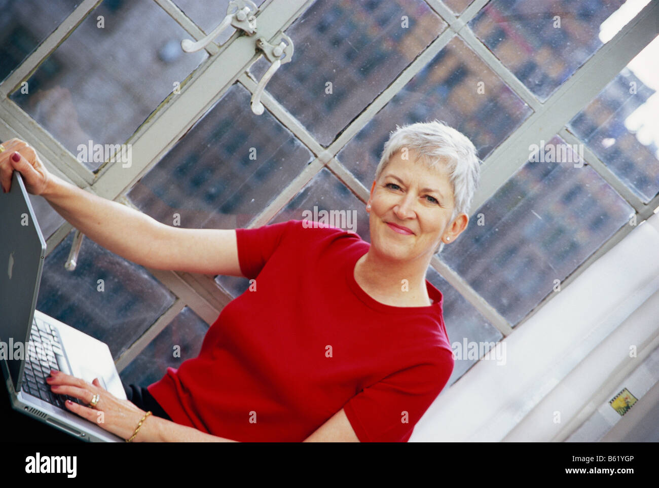 Mature Woman smiling at camera, USA 2006 Stock Photo - Alamy