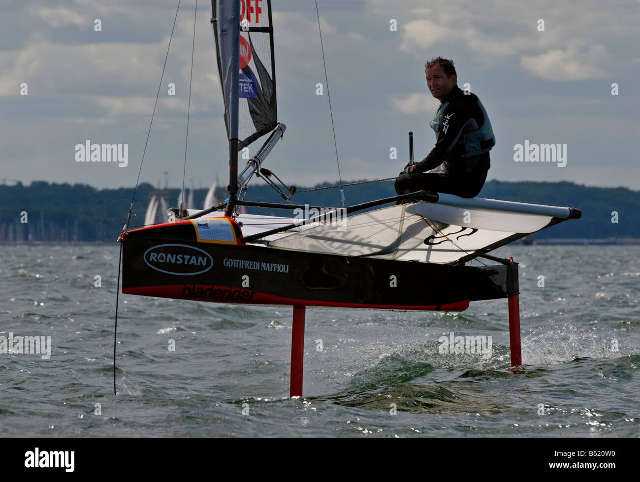 Sailor competing in the regatta for the sailing boat category ...