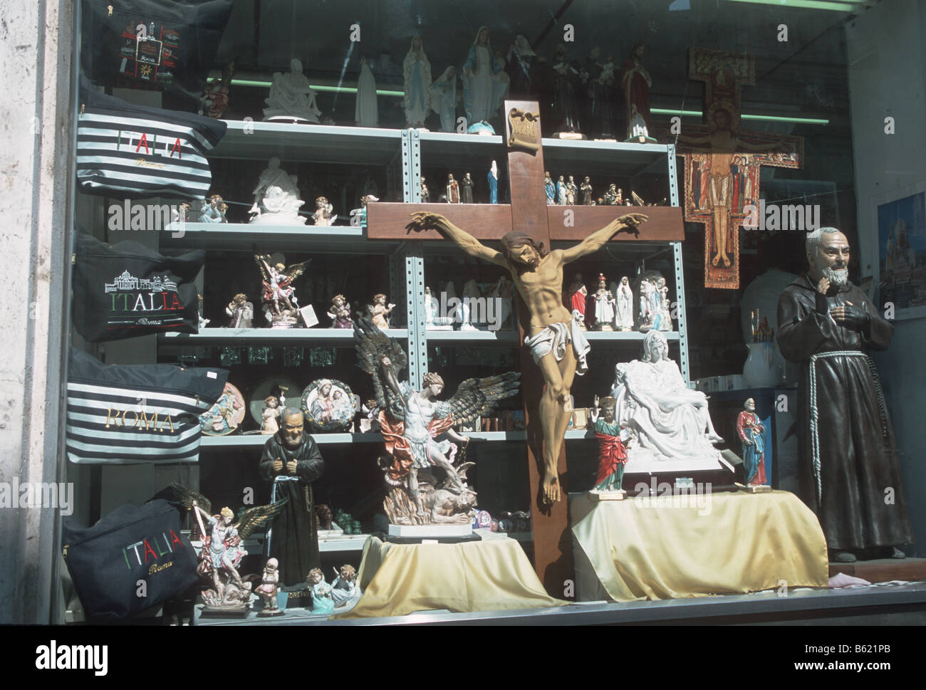ITALY.IMAGES OF JESUS CHRIST AND SAINTS AT RELIGIOUS SHOP WINDOW IN ...