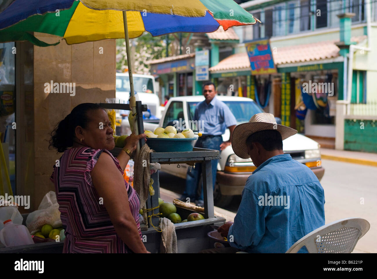 Vendor, shops, street in Coxen Hole, capital city, Roatan, Bay Island ...