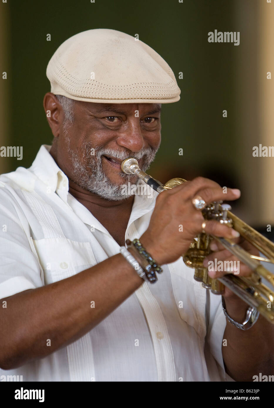 Cuban jazz musician playing in a restaurant, Plaza Mayor, Trinidad ...