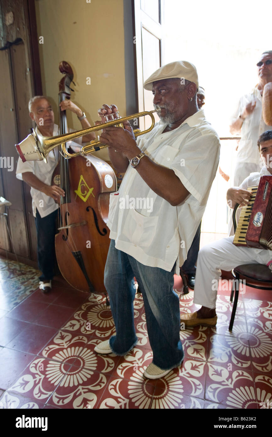 Cuban jazz musicians playing in a restaurant, Plaza Mayor, Trinidad ...