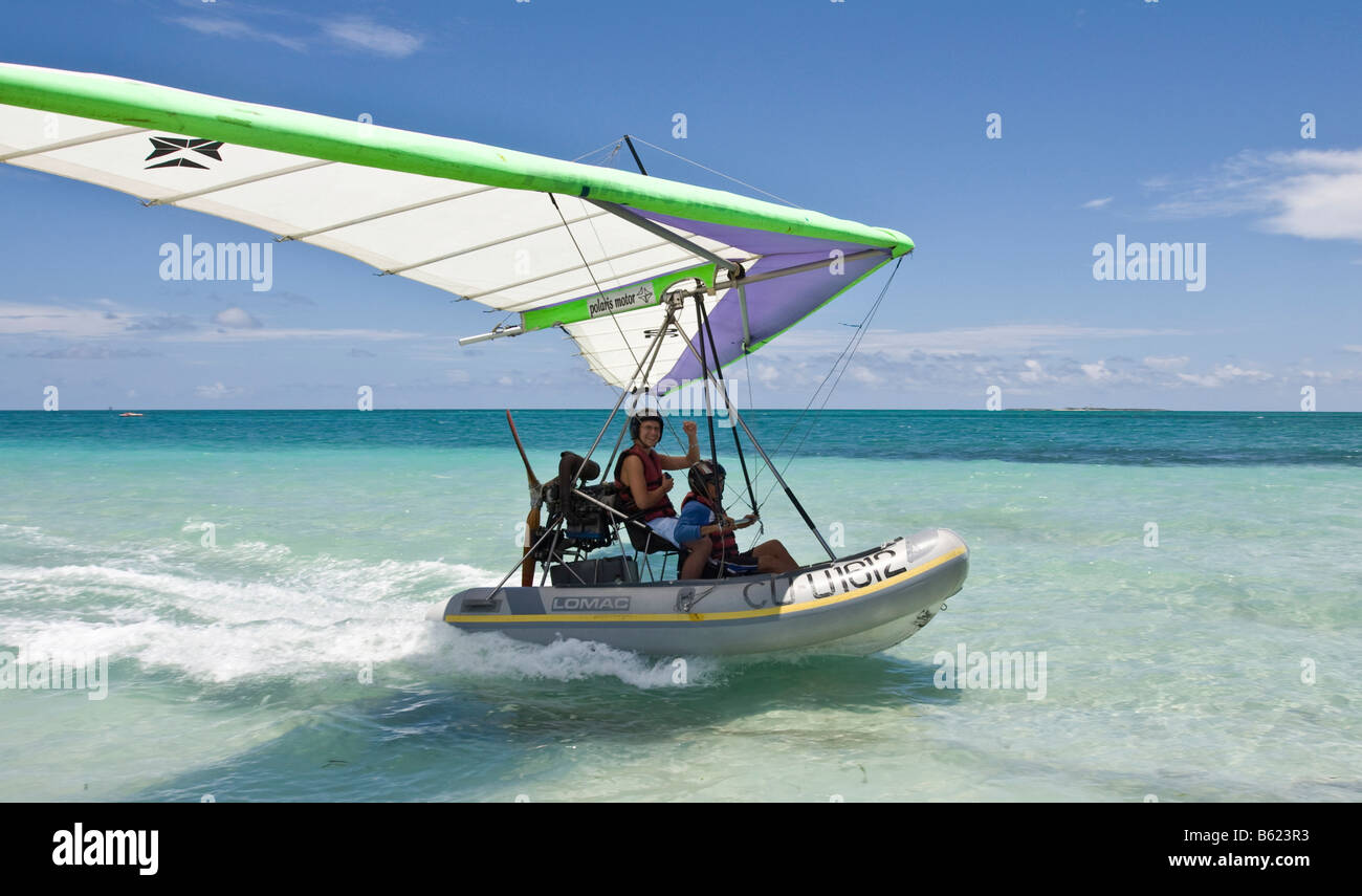 Motorised hang glider landing on the sea, UL-Trike, Ultra Light ...