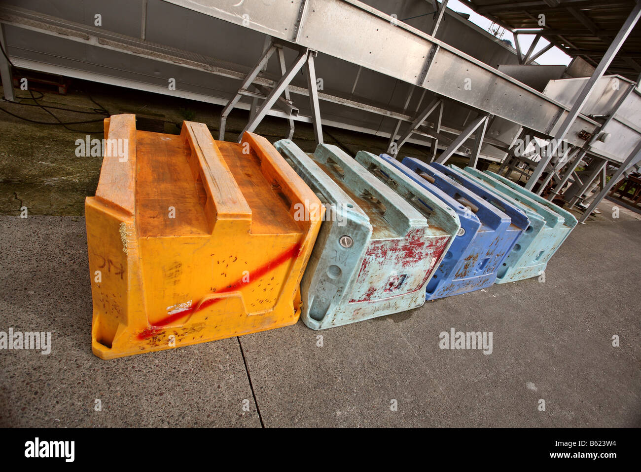 Three colorful fishing net anchors at Port Edward British Columbia ...