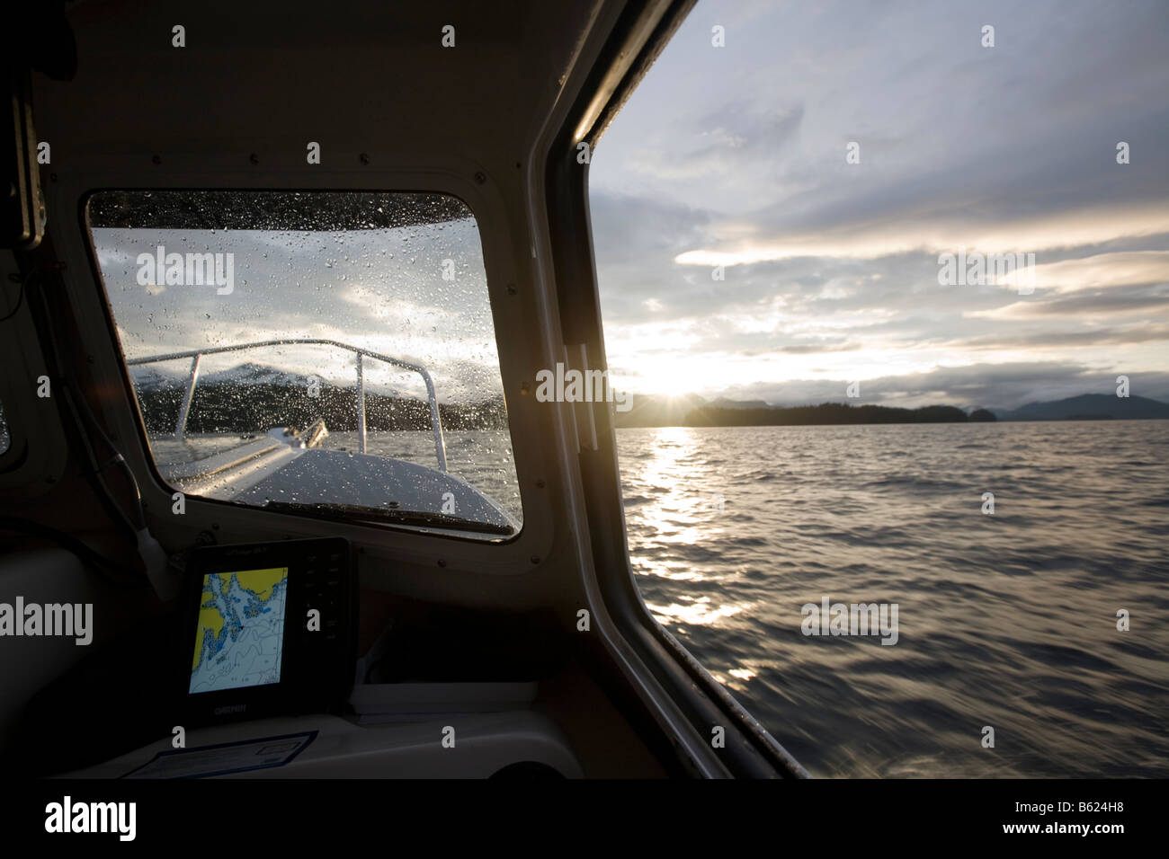 USA Alaska View through windows of power boat motoring through ...