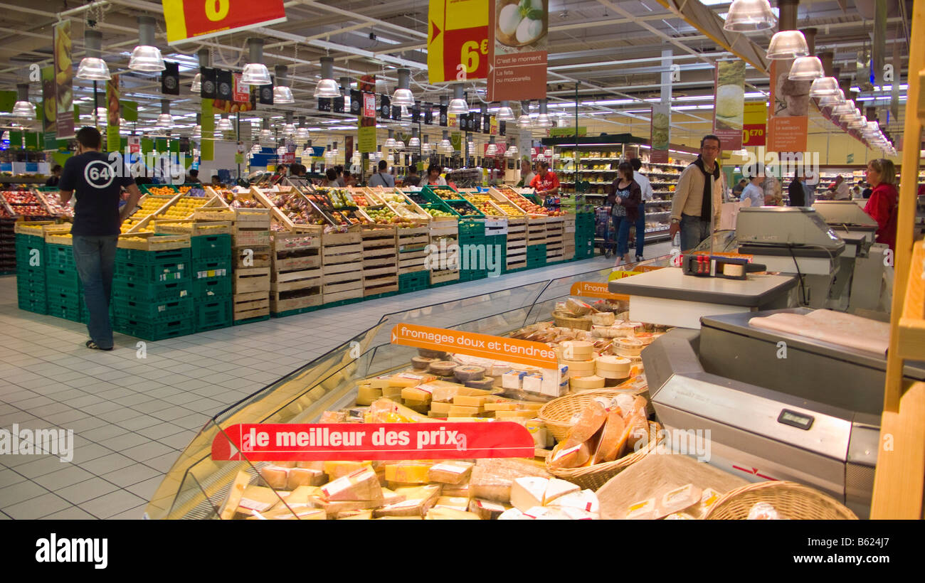 Cheese and fresh produce section in a French supermarket La Rochelle ...