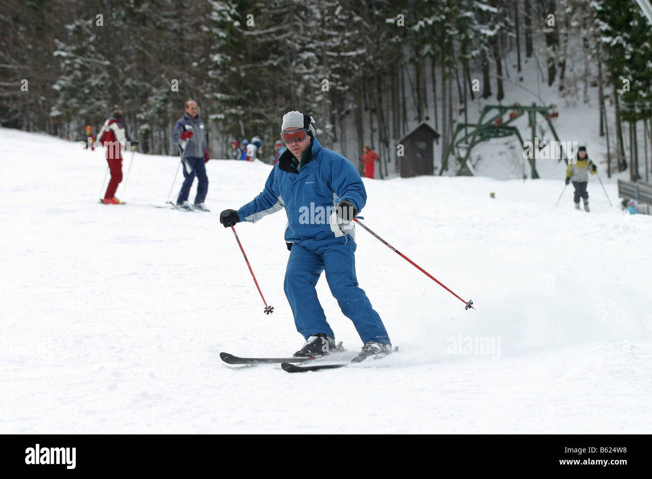 A man skiing on snow Stock Photo - Alamy
