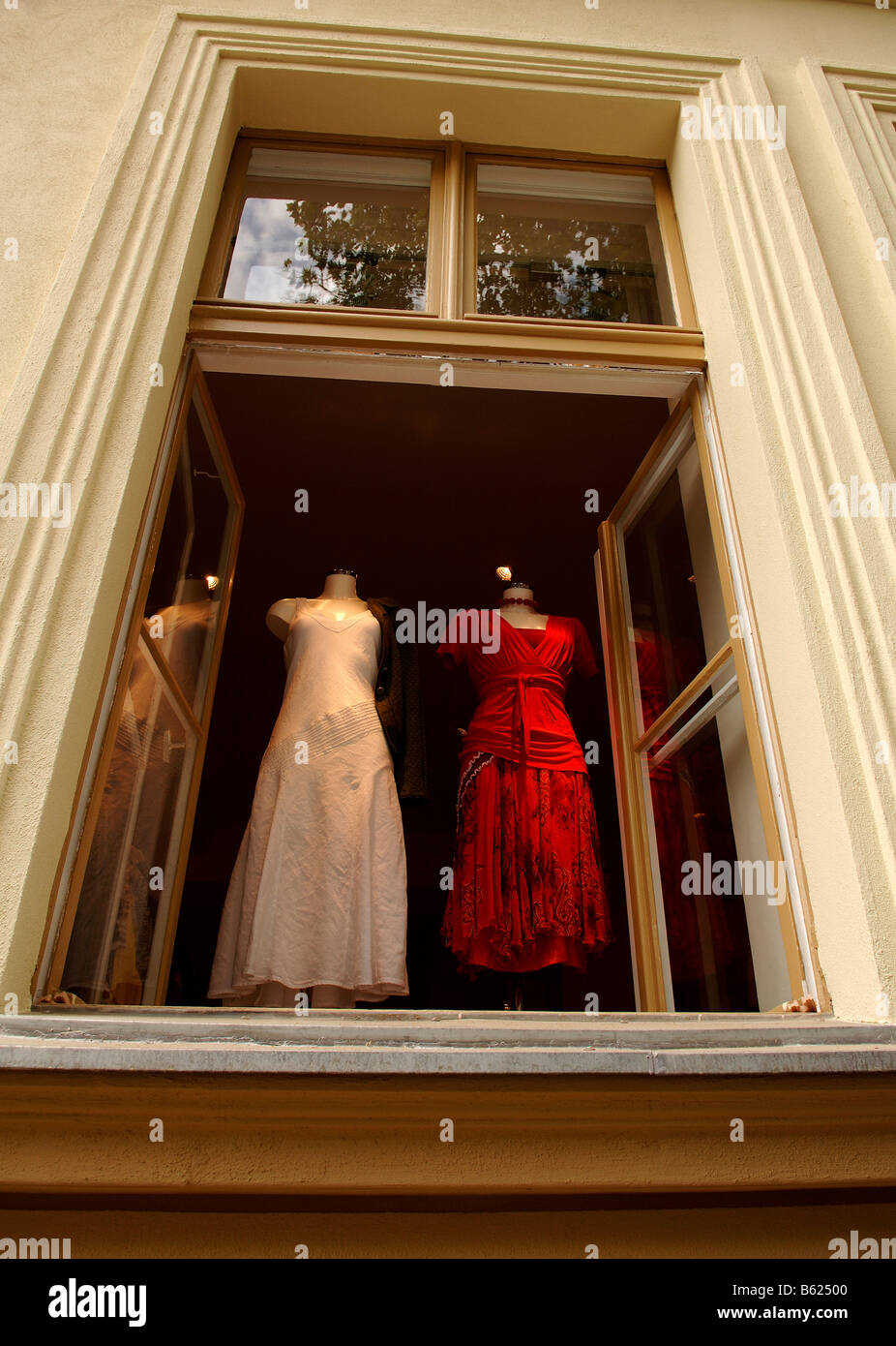 Shop window dolls at the open window of a fashion shop, Prenzlauer Berg ...