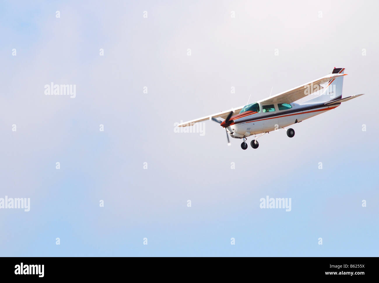 Airplane landing rear view hi-res stock photography and images - Alamy