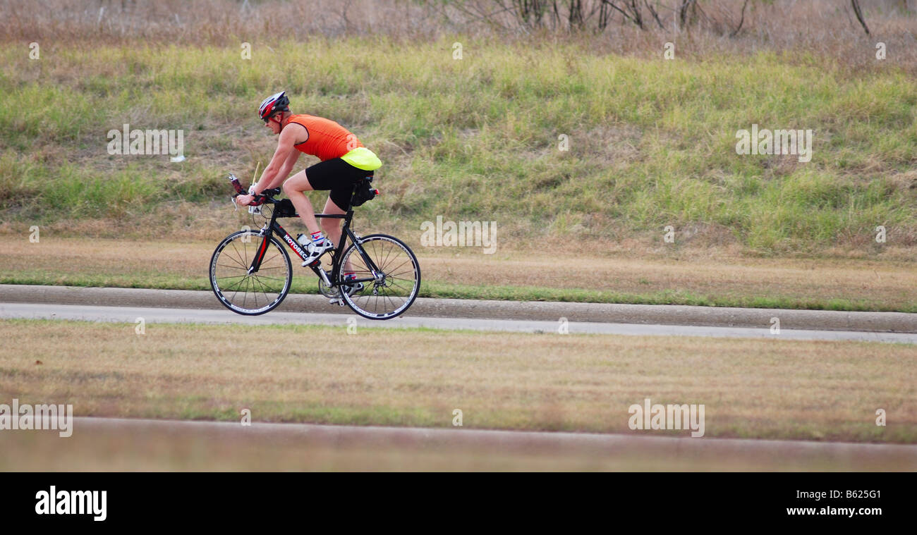 Cyclist riding on long hi-res stock photography and images - Alamy