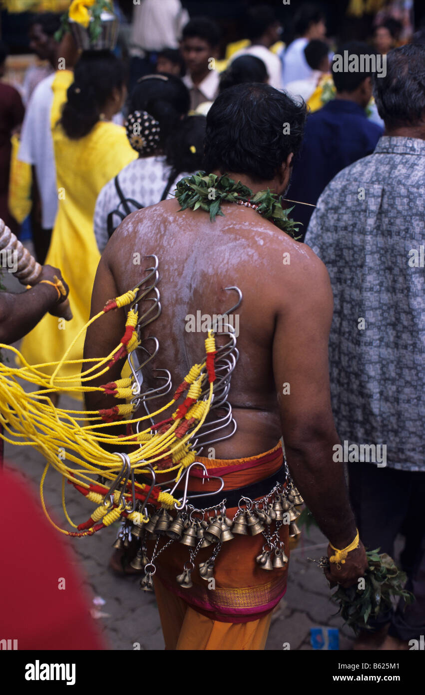 Back pierced with meat hooks hi-res stock photography and images - Alamy