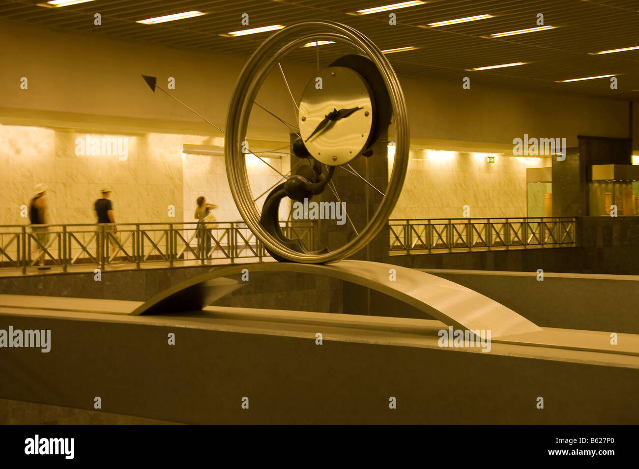 The golden clock of Athens metro Greece Stock Photo - Alamy