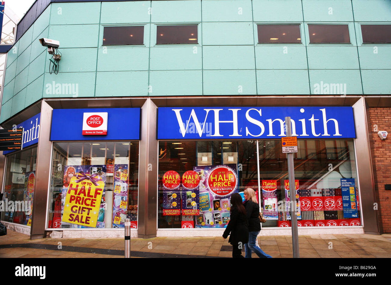 Well known UK high street retail store shop with half price sale signs ...