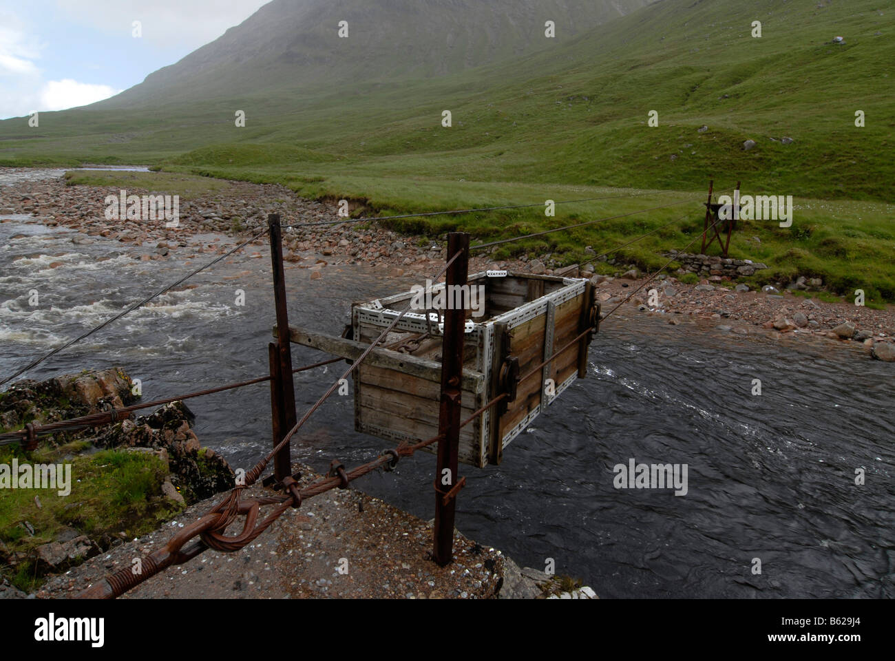 Adventurous drawbridge, ropeway, for hikers crossing the Etive River ...