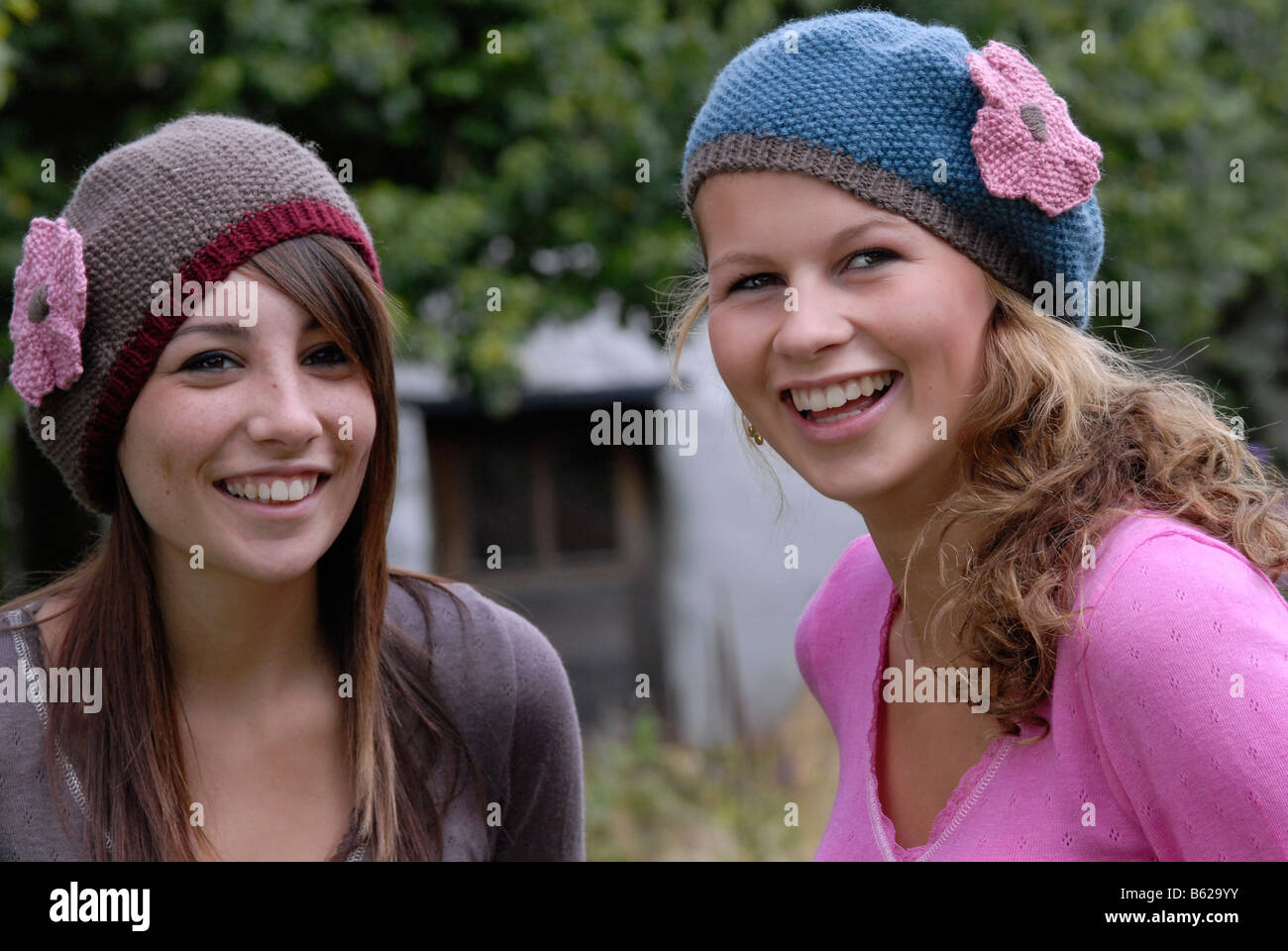 Portrait of two teenage girls wearing berets Stock Photo - Alamy