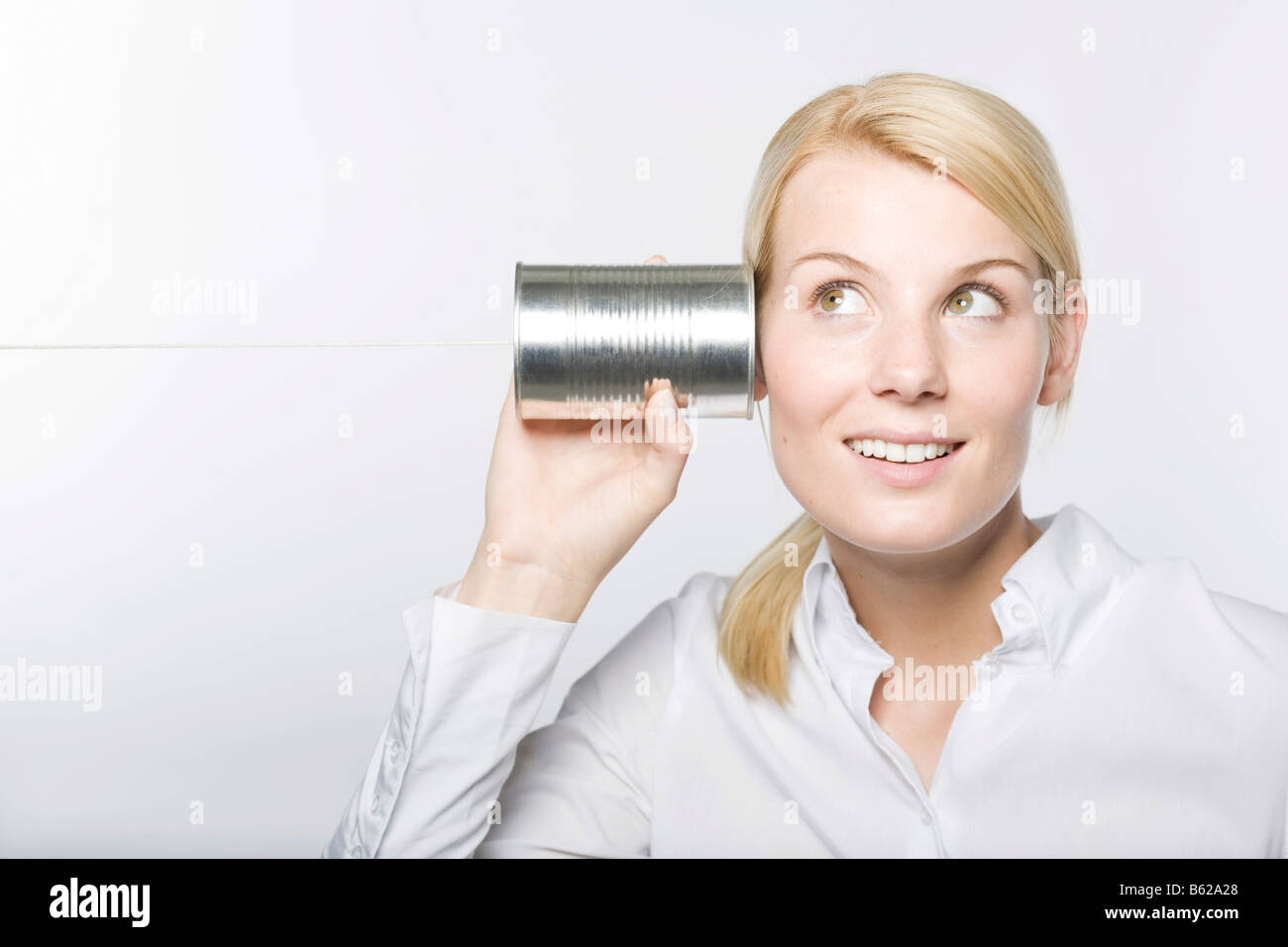 Tin cans telephone hi-res stock photography and images - Alamy