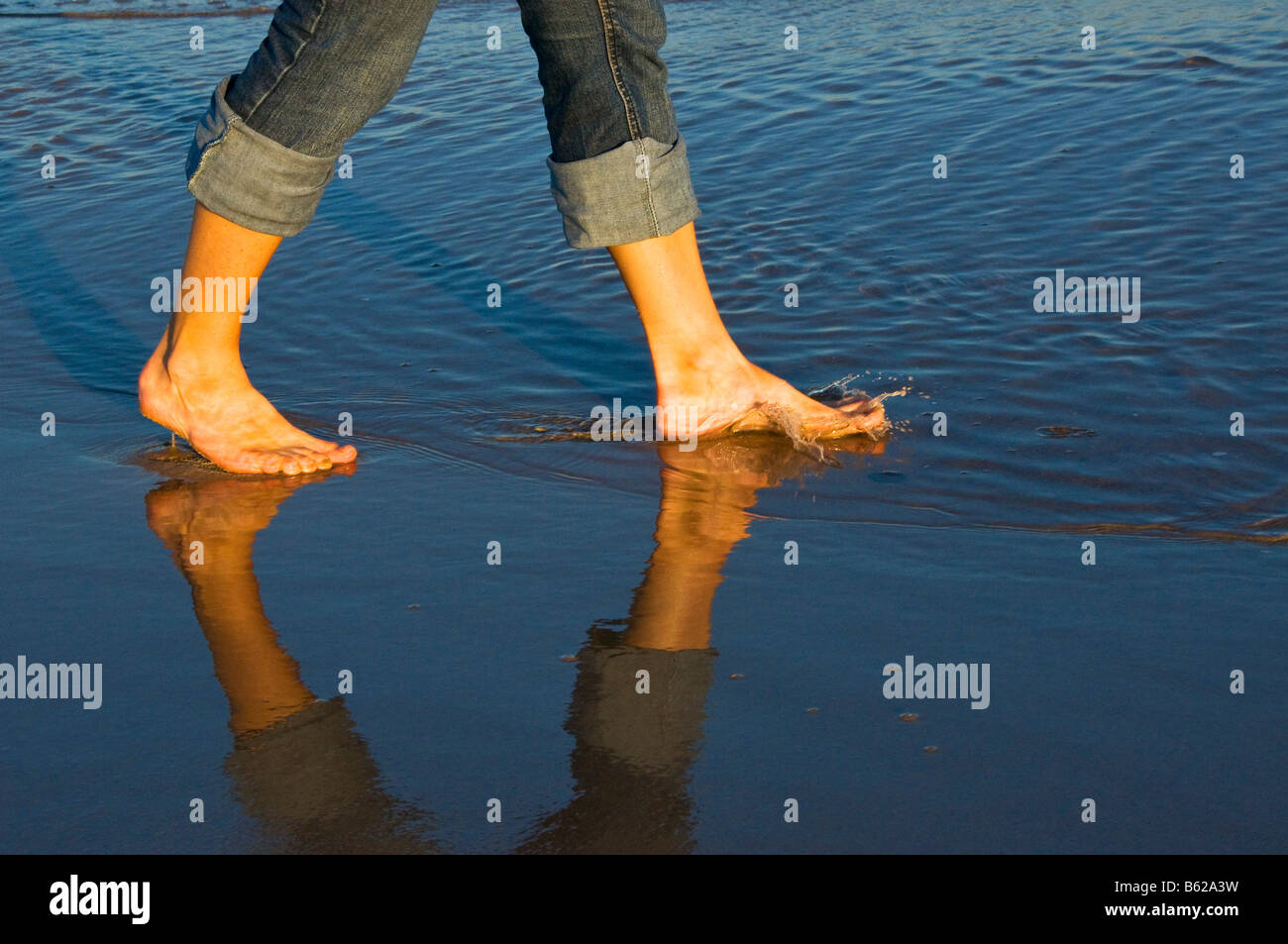 Female Feet on a beach Stock Photo - Alamy