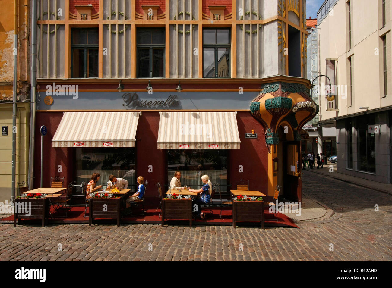 Modern street café in the historic city centre of Riga, Latvia, Baltic ...