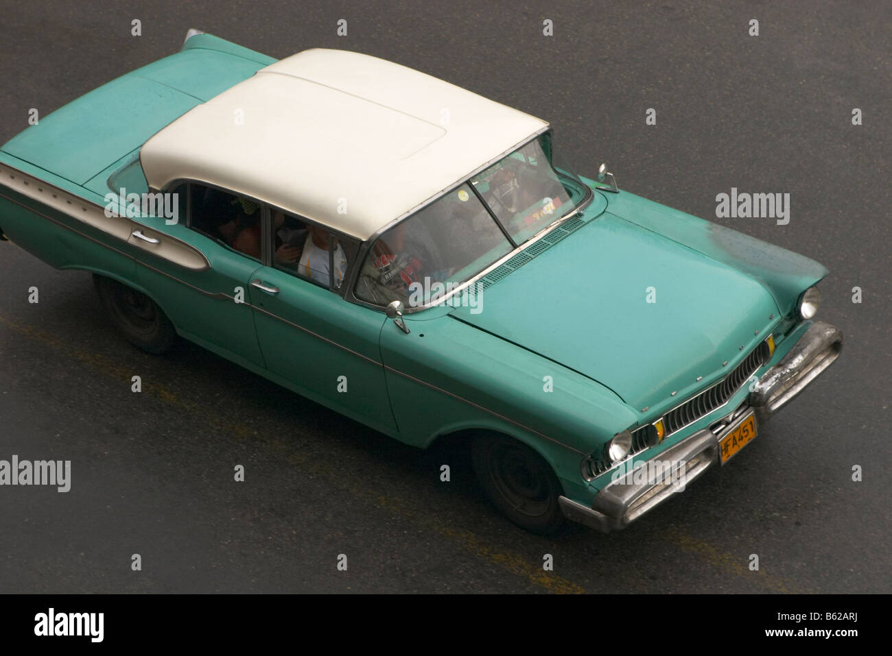 An old american car, blue green in colour with a white roof, Havana ...