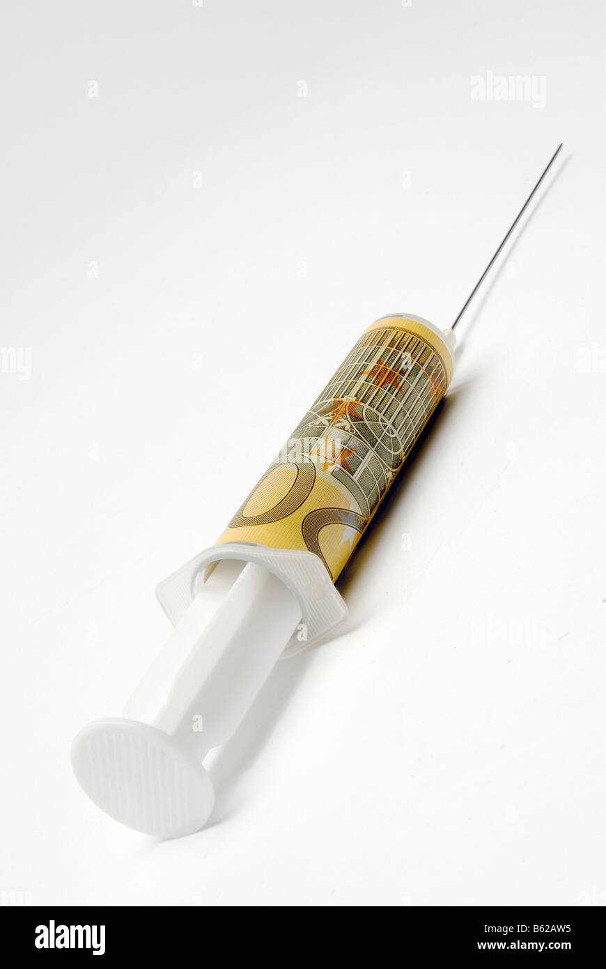 Bank note in a syringe, money injection Stock Photo - Alamy