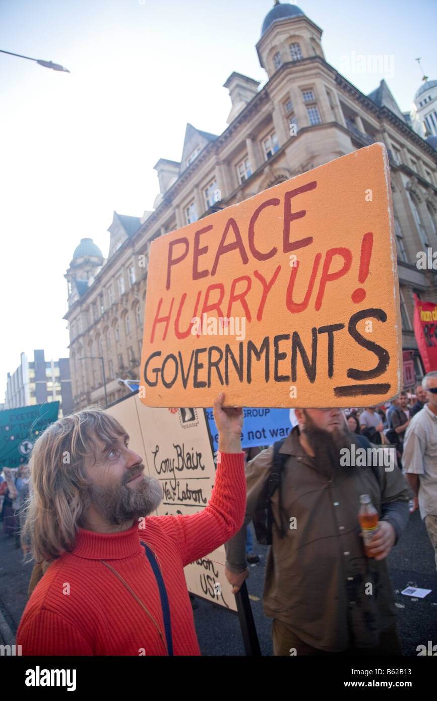 Peace Protester with Banner, Manchester, UK Stock Photo - Alamy