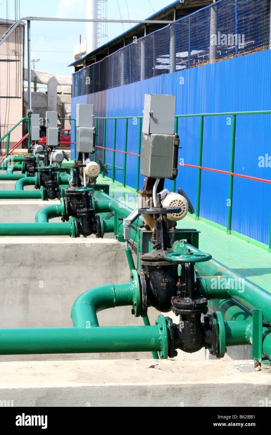 Motor and pipe on blue wall Stock Photo - Alamy