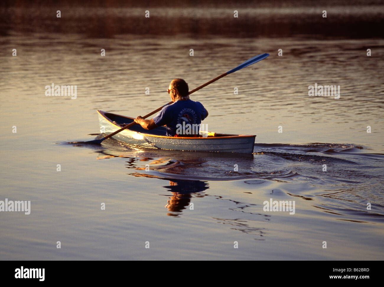 Man kayaking at sunset on Lake Galena, Peace Valley Park, Bucks County ...