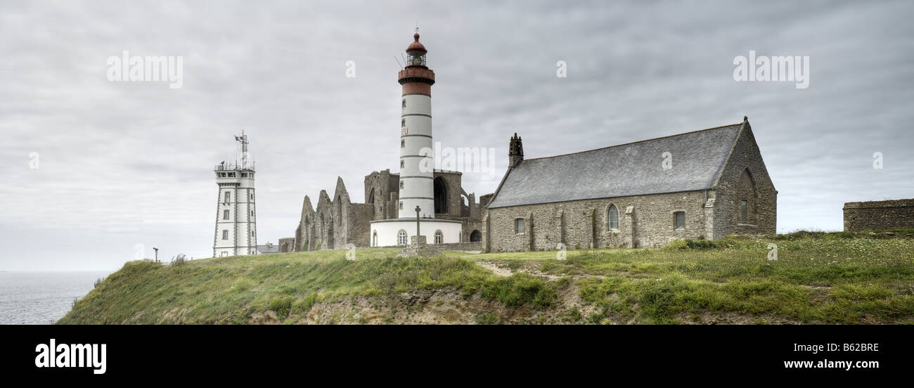 Phare de Saint Mathieu Lighthouse with the ruins of the monastery, tone ...