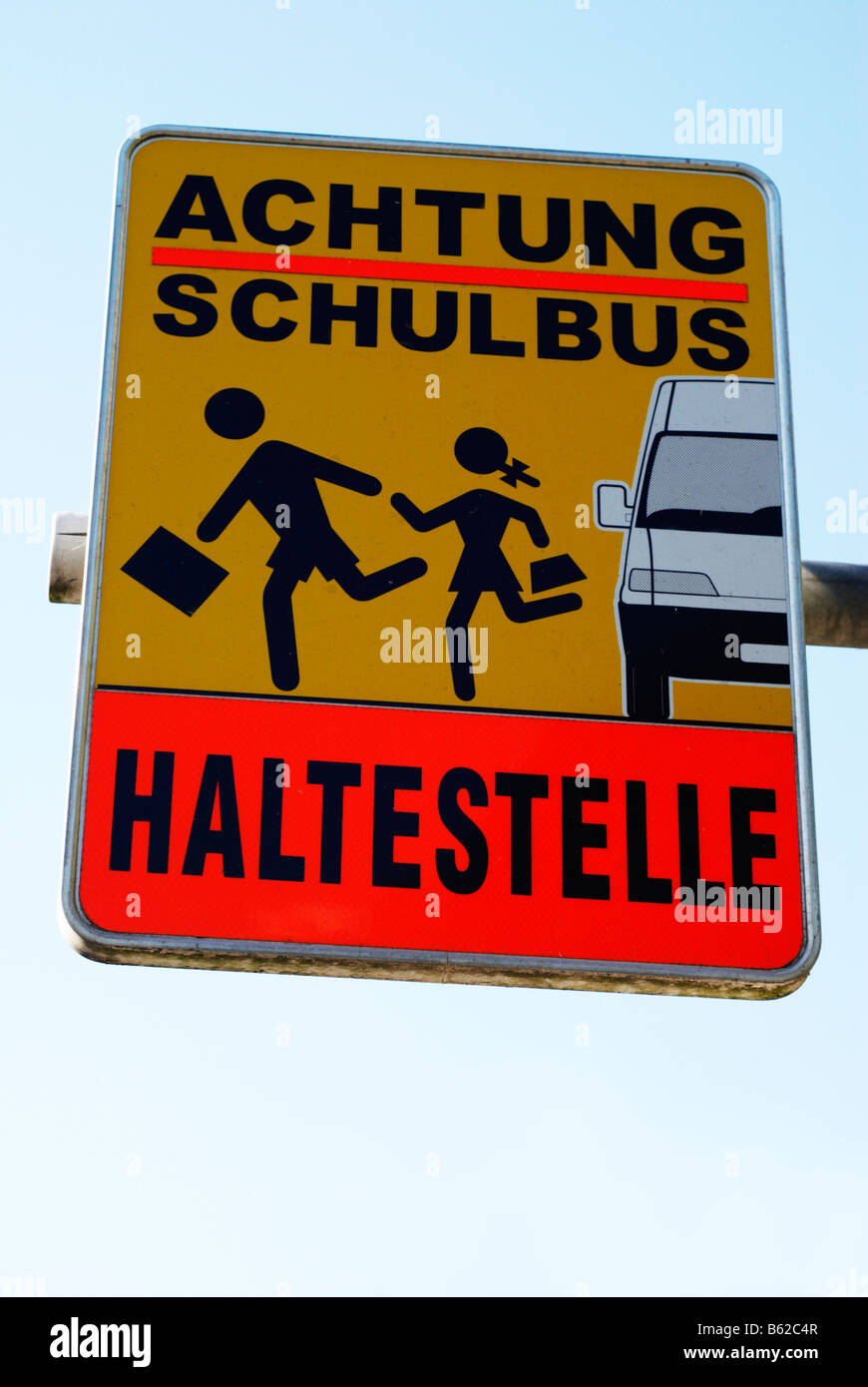 Sign cautioning Achtung Schulbus Haltestelle, literally caution school ...