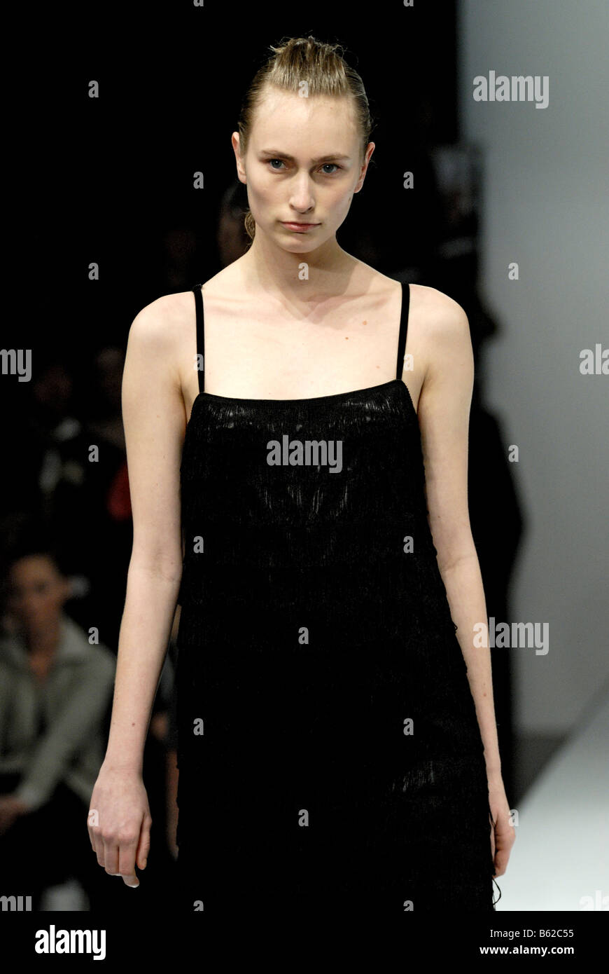 Girl wearing white singlet hi-res stock photography and images - Alamy