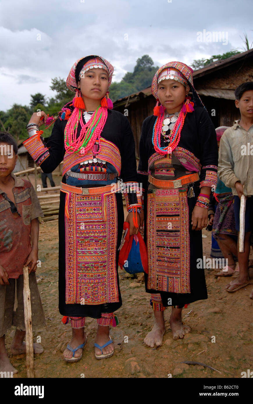 Young women of the Akha Pala tribe wearing traditional colourful ...