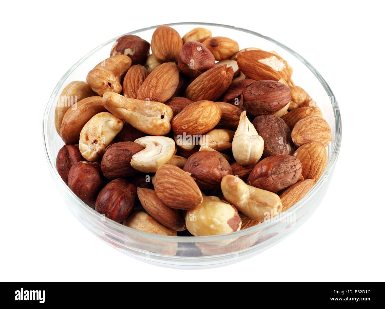 Nut mix with hazelnut and almond on white Stock Photo - Alamy