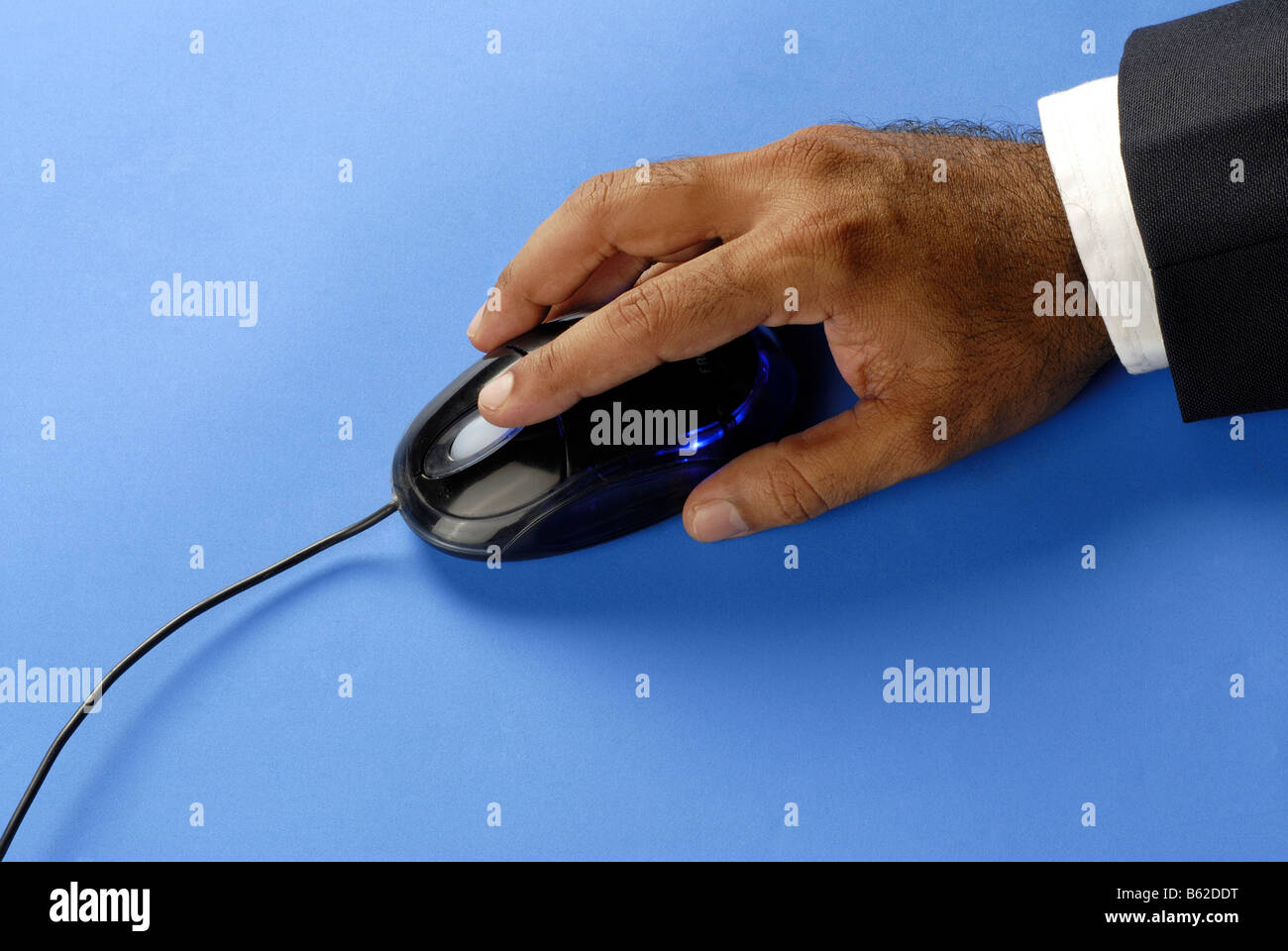 HAND HOLDING A MOUSE Stock Photo - Alamy