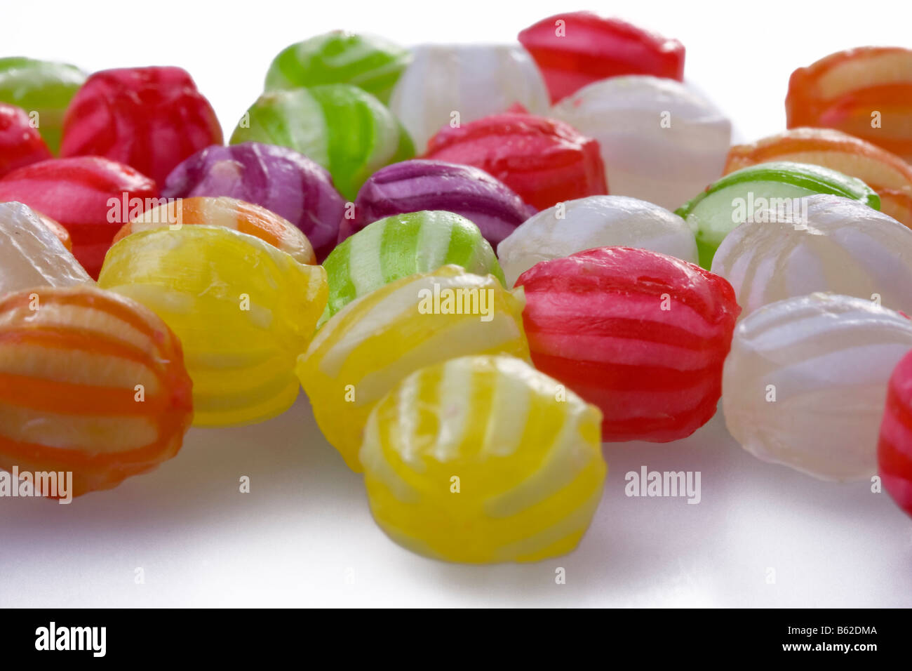 colorful hard sweets on white backround Stock Photo - Alamy