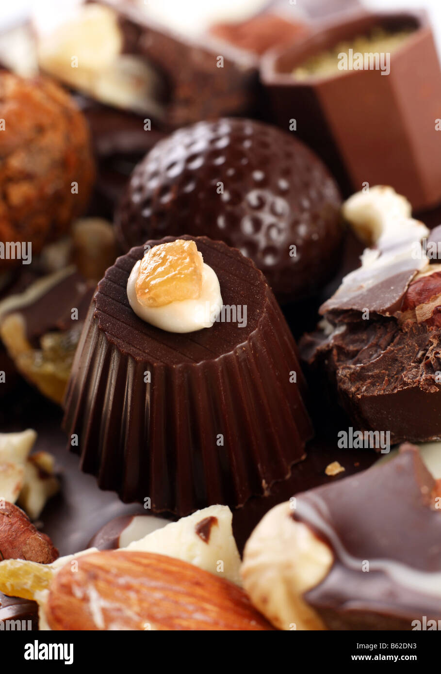 Chocolate candy group detail background with nut Stock Photo - Alamy